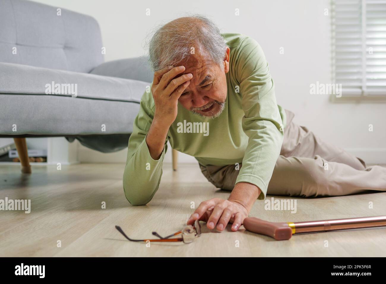 Elderly people accident slip and fall, Accident of senior slip and fall to floor Stock Photo - Alamy