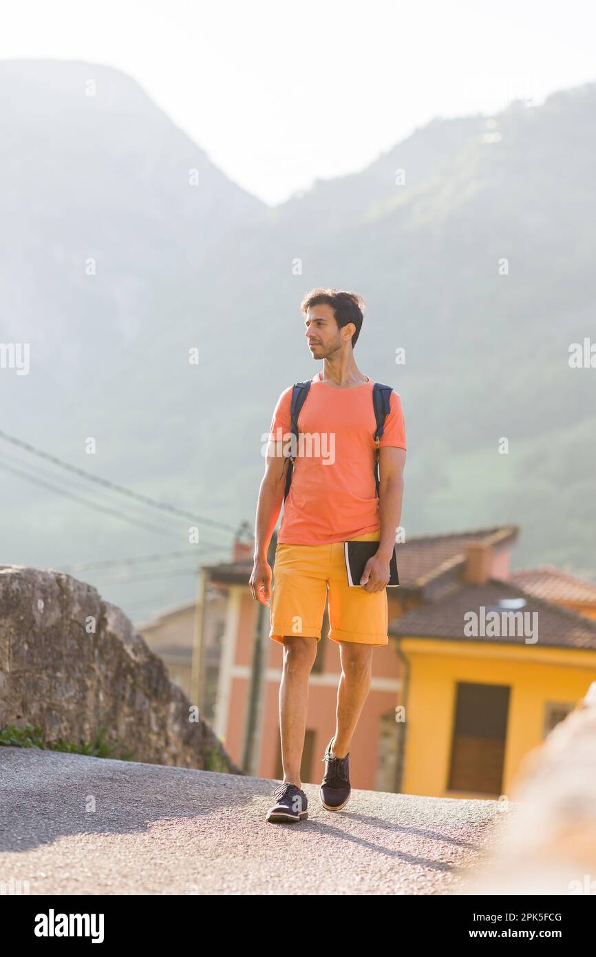 Indian mid man in Asturias summer vacation. Casual hiker adventure with ...