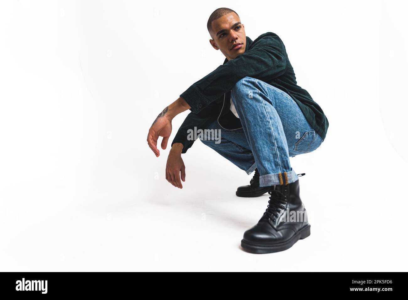 Modelling concept. Assured focused young adult guy in fashionable ...