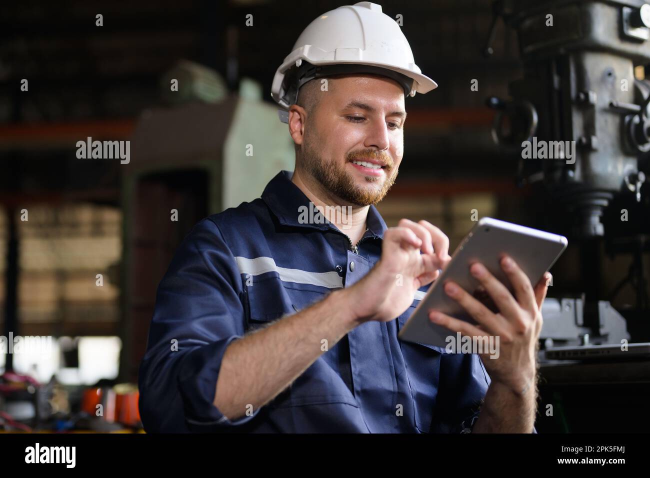 Maintenance engineer worker working at manufacturing plant factory ...