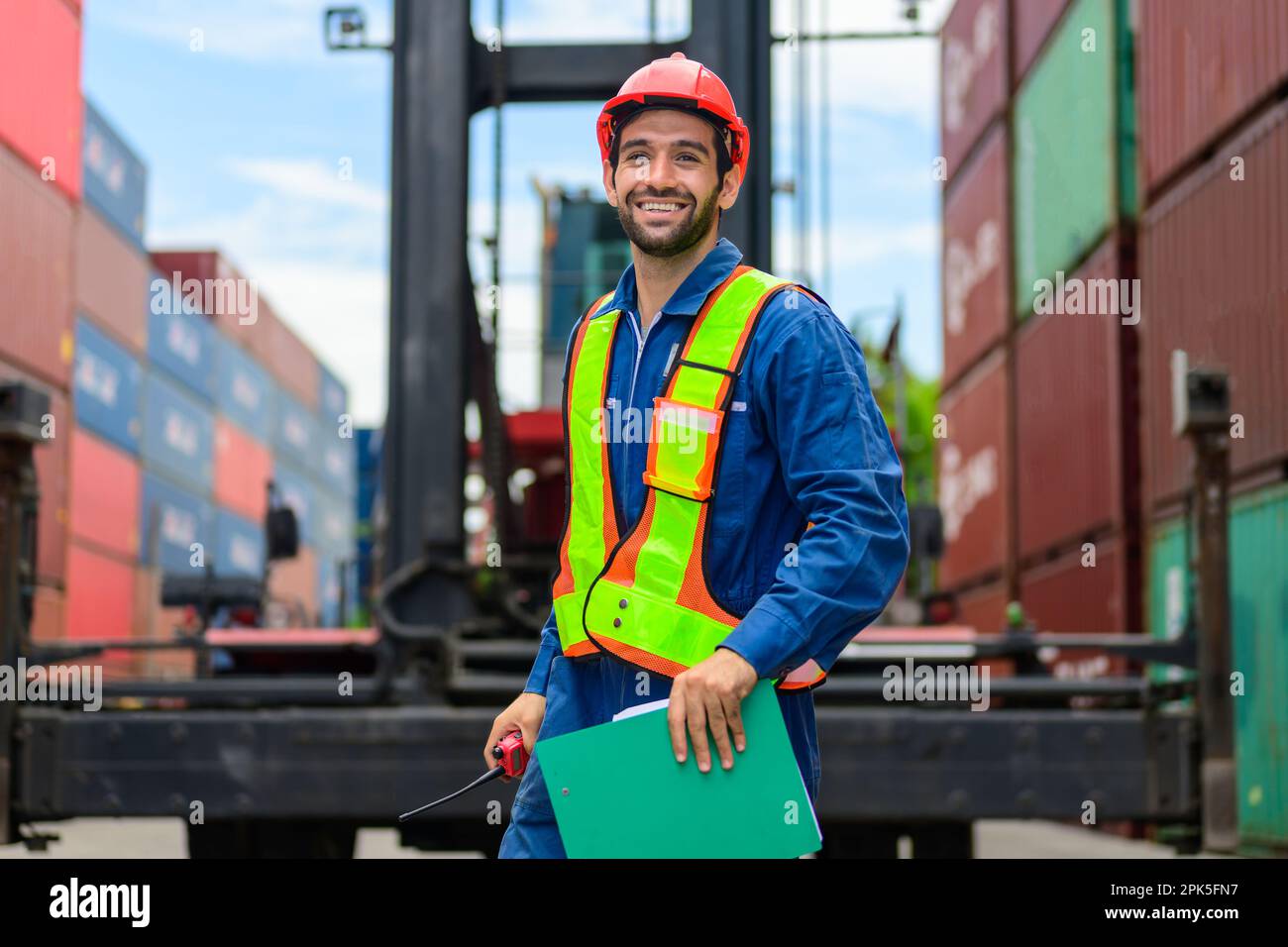 Warehouse engineer worker checking and working at industrial container ...