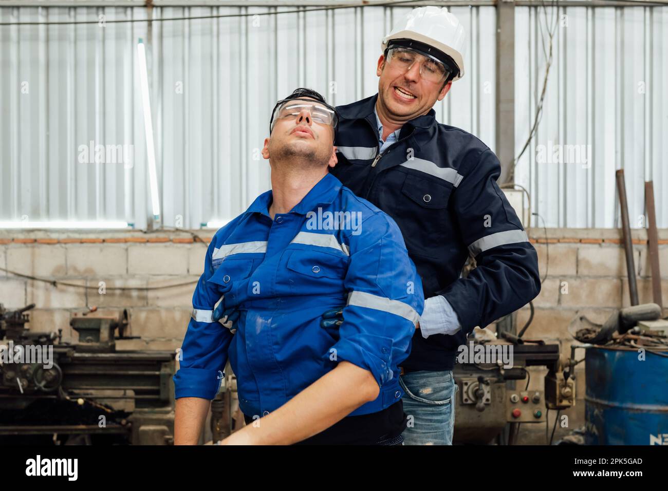 Engineer worker with accident at factory, Injury from machine working ...