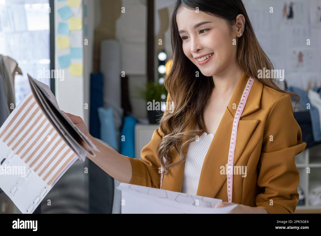 Female designer business owner, Tailoring business owner Stock Photo ...