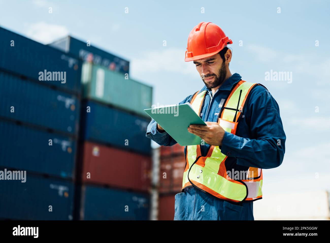 Warehouse engineer worker working at industrial container yard Stock ...