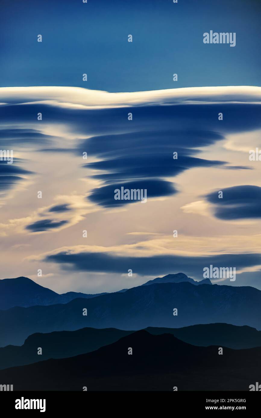 Lenticular UFO Clouds form at Sunrise Stock Photo - Alamy Lenticular UFO Clouds form at Sunrise Stock Photo - Alamy