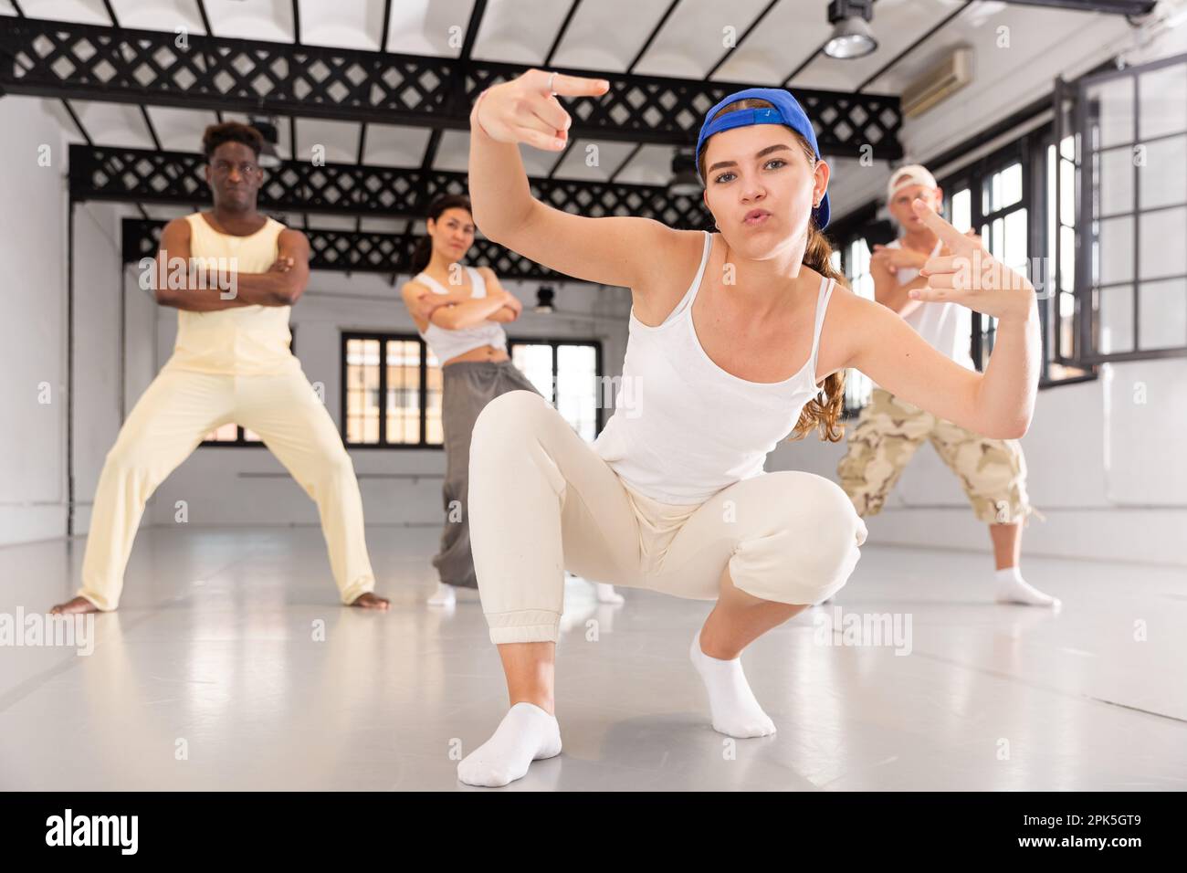 Young beautiful female dancer enjoying dancing break dance Stock Photo ...