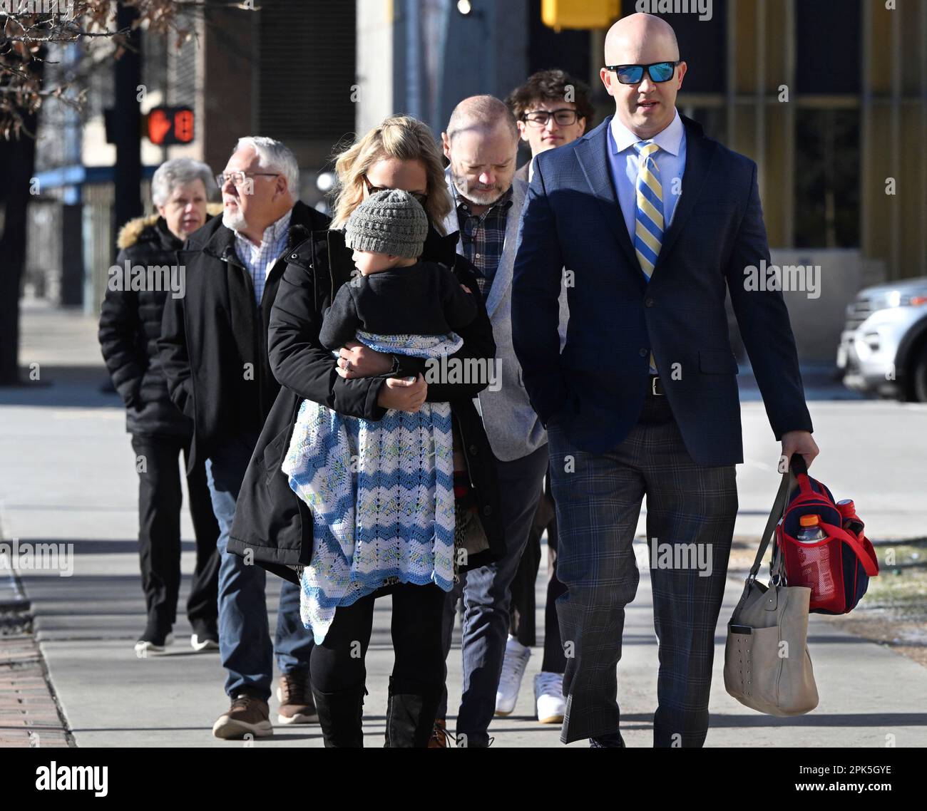 Al Stauch, right, father of Gannon Stauch, walks into the El Paso ...