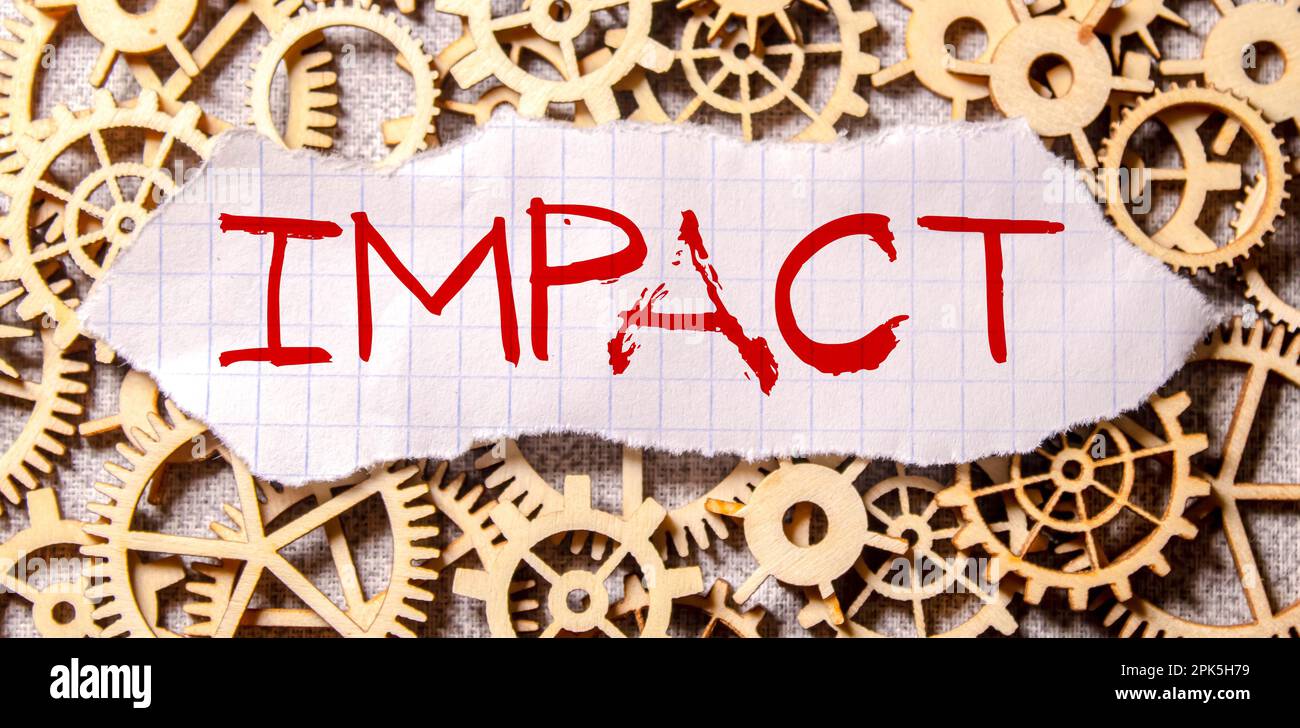 Word impact on the torn paper. Concept Stock Photo - Alamy