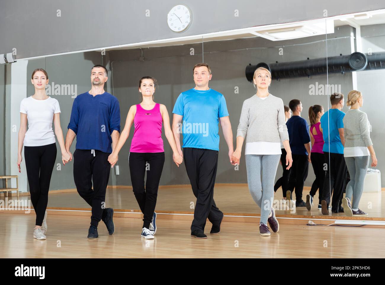People fulfilling Celtic dance movements Stock Photo - Alamy