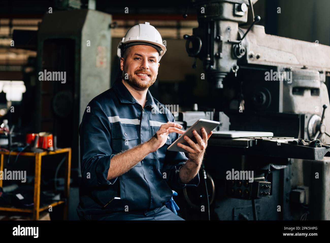 Specialist engineer worker working together at manufacturing plant ...