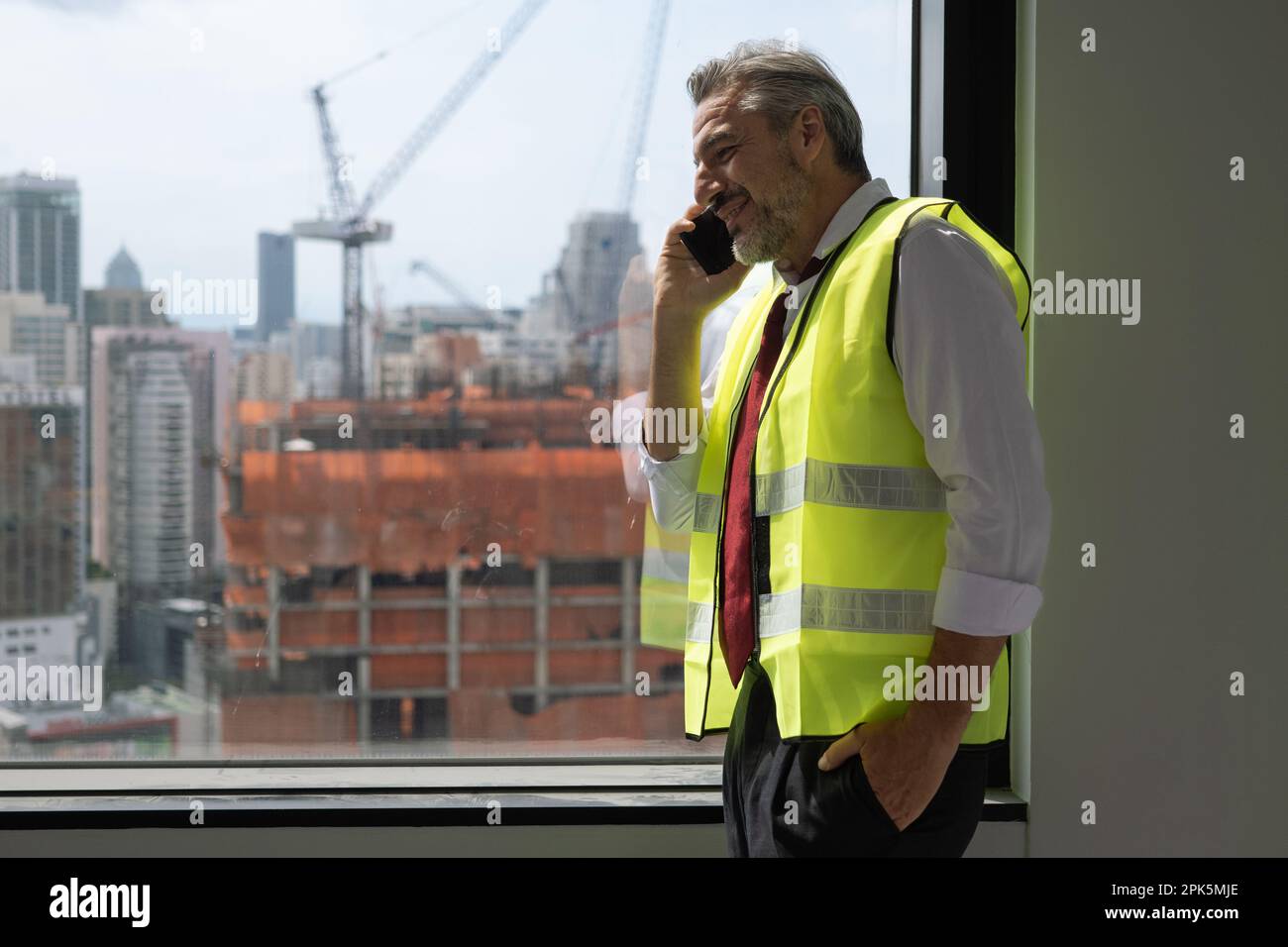 Portrait happy civil engineer talking hi-res stock photography and ...