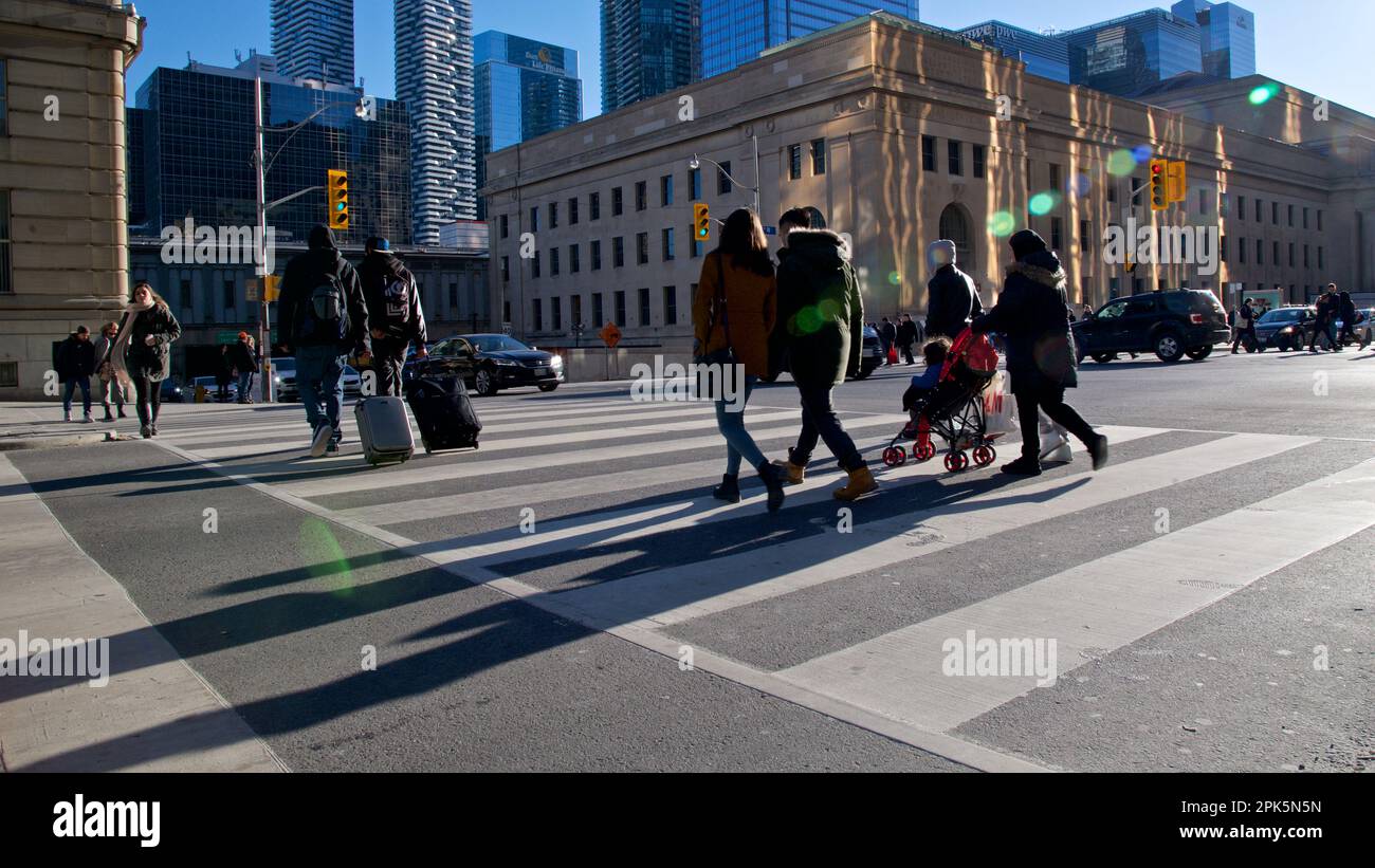 Toronto, Ontario/ Canada - 03-04-2018: People crossing the crossroad at ...