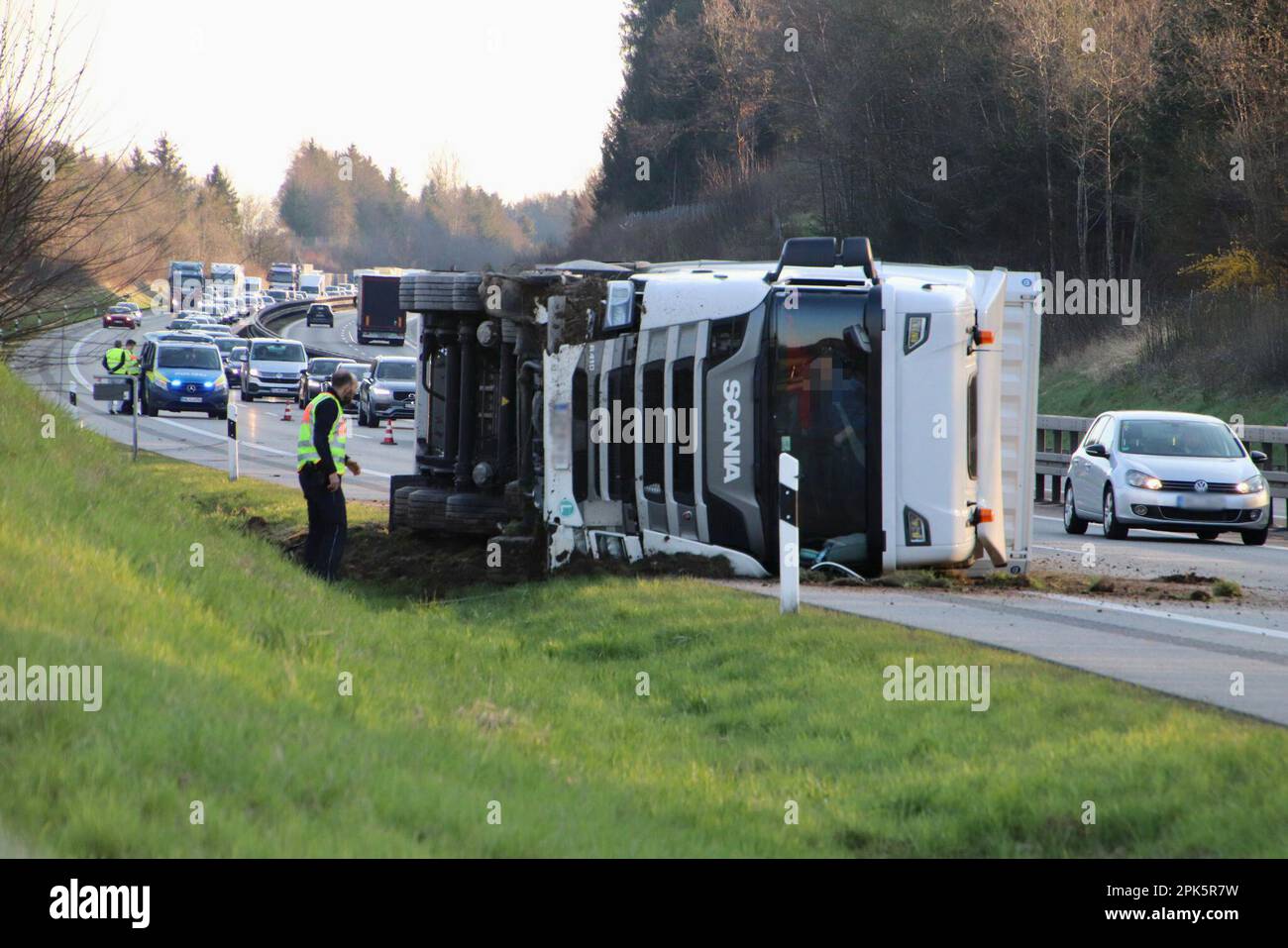 05 April 2023, Baden-Württemberg, Neuravensburg: A policeman stands ...