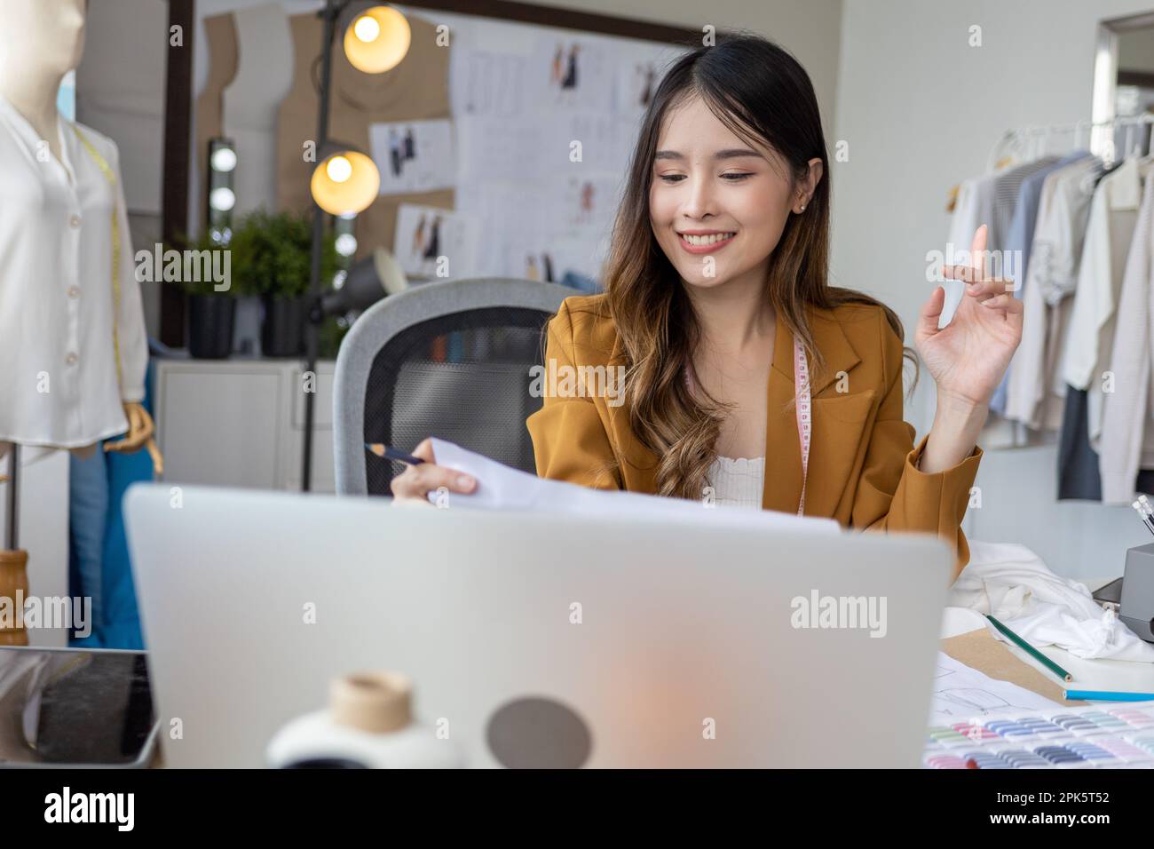 Female designer business owner, Tailoring business owner Stock Photo ...