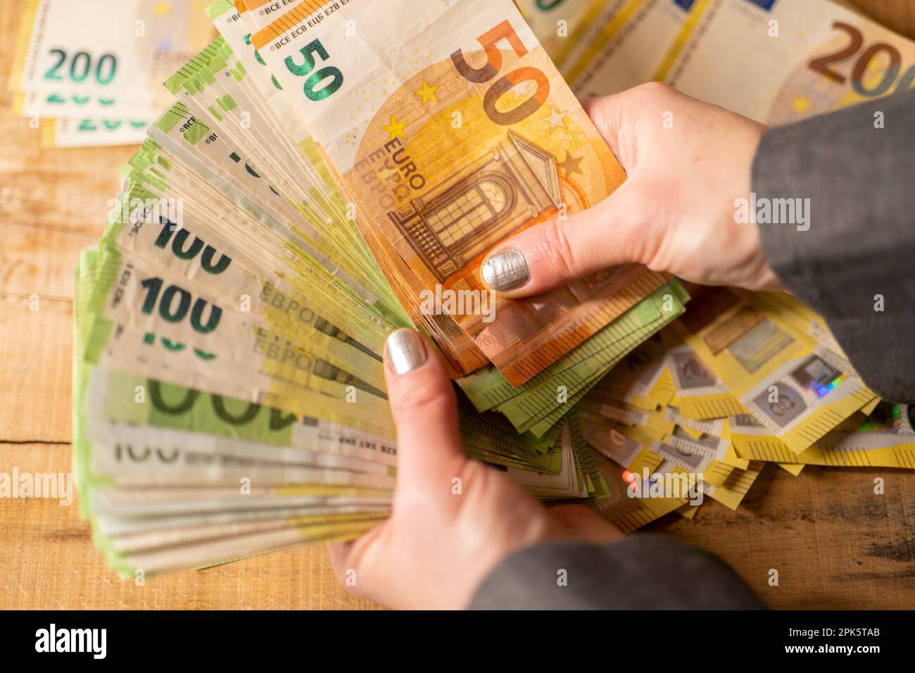 Recalculation of money. Counting euro banknotes.Hands recalculate ...