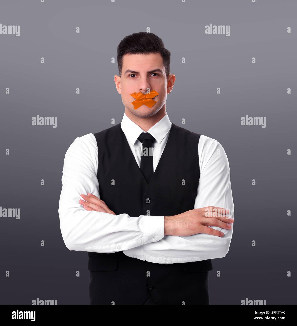 Man with taped mouth on grey background. Speech censorship Stock Photo ...