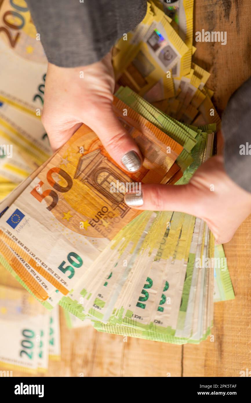 Recalculation of money. Hands recalculate banknotes.Expenses and ...