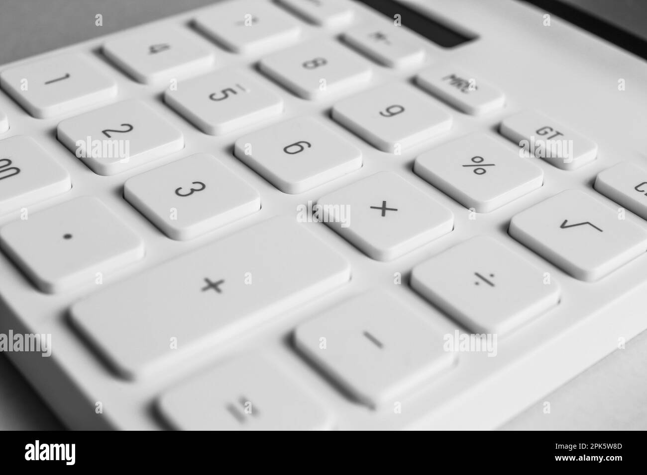 Calculating with calculator Black and White Stock Photos & Images - Alamy