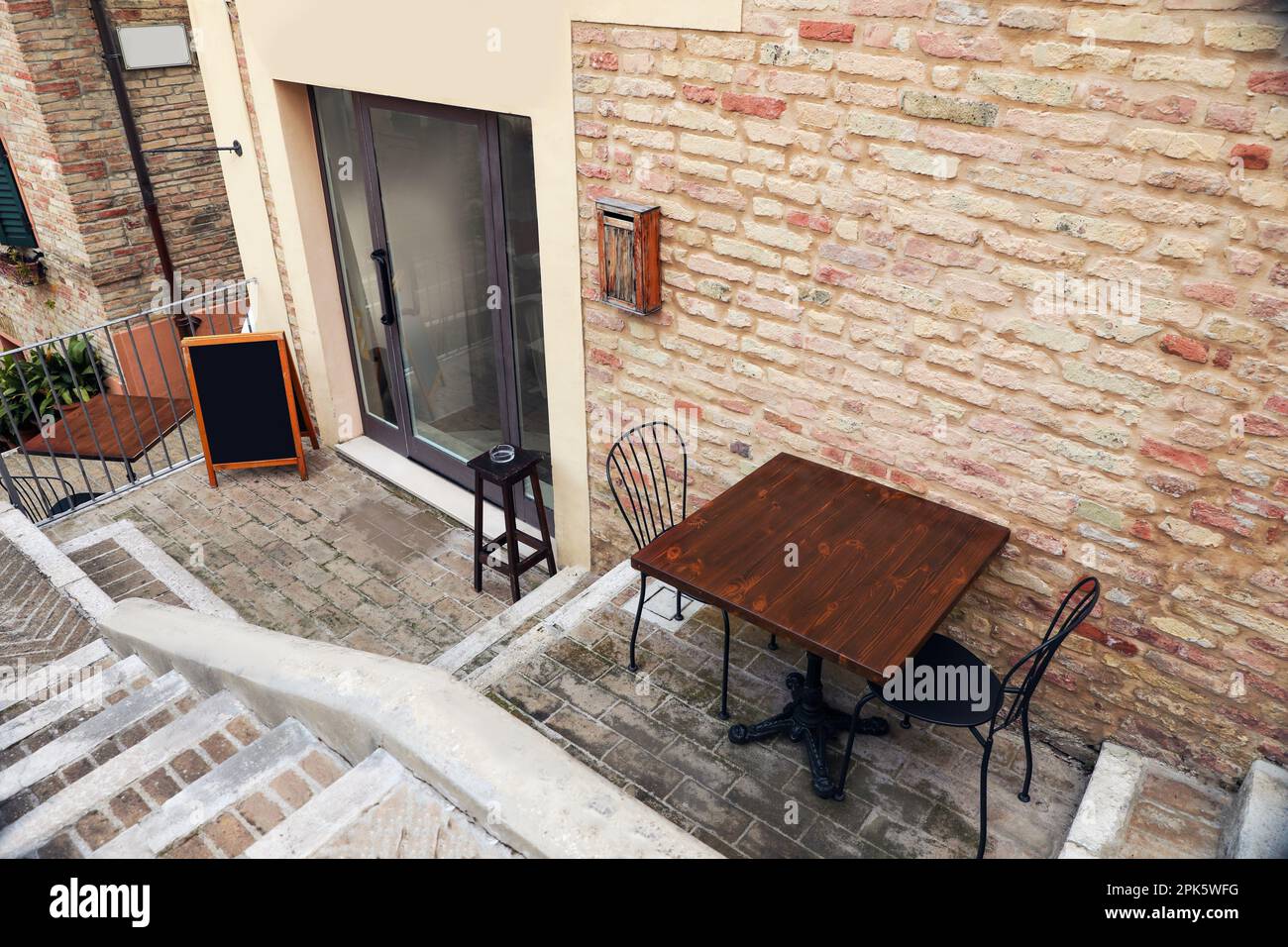 Beautiful view of cozy cafe with outdoor terrace Stock Photo - Alamy