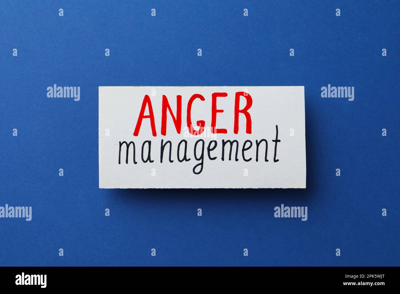 Card with words Anger Management on blue background, top view Stock ...