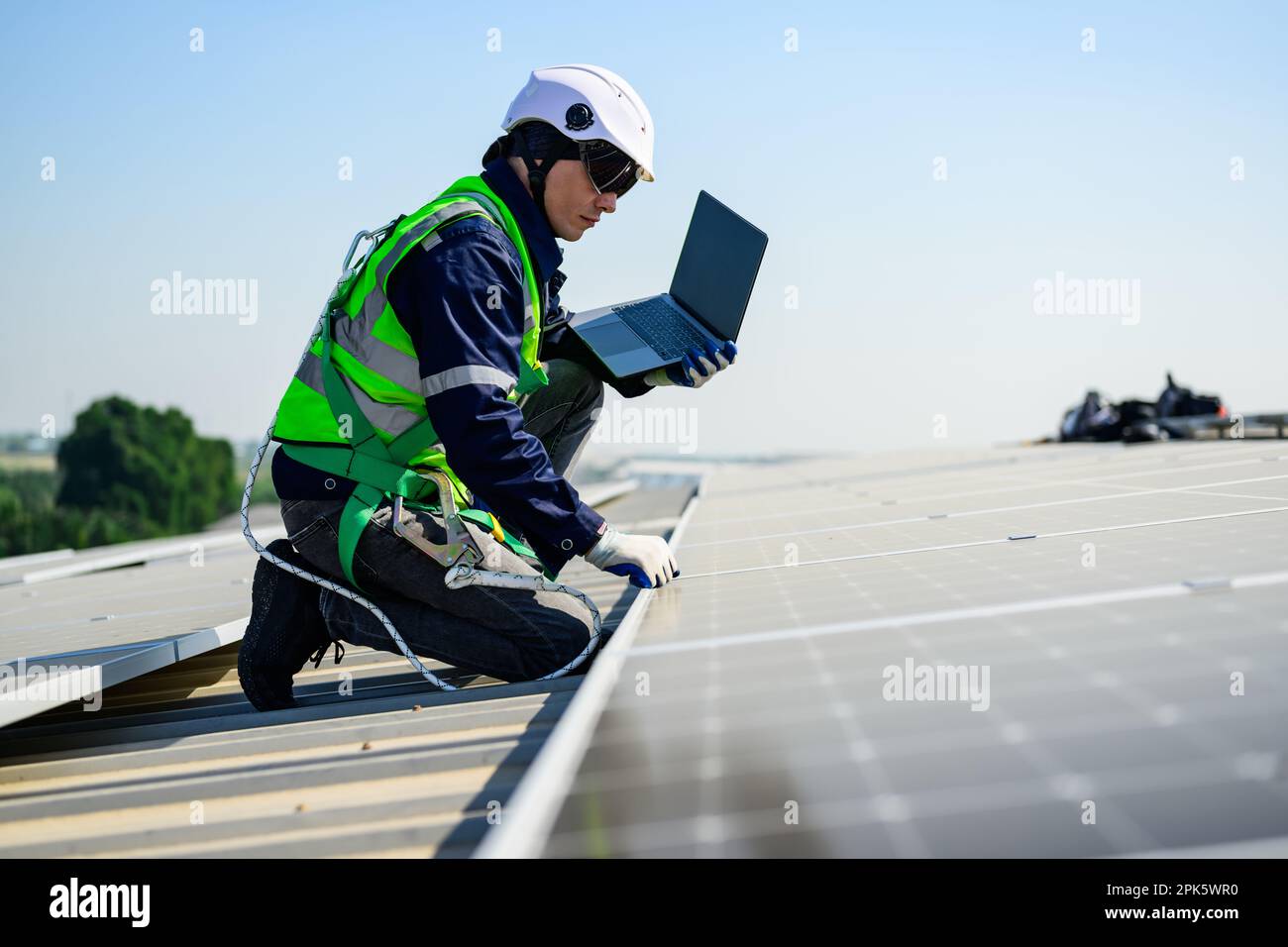Professional engineer technician with safety helmet checking system ...