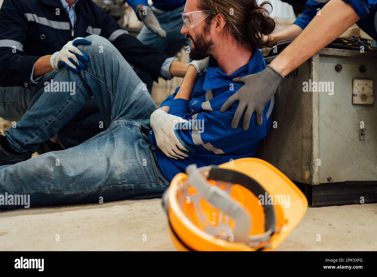 Engineer worker with accident at factory, Injury from machine working ...