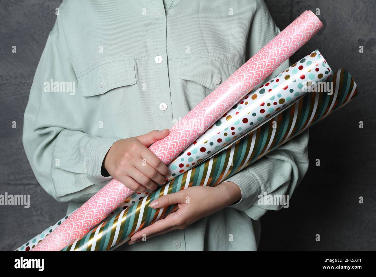 Woman wrapping paper rolls hi-res stock photography and images - Alamy