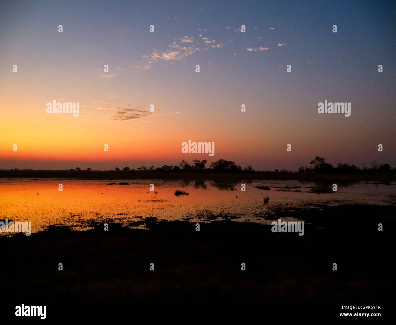 Sunset over Selinda Reserve, Botswana Stock Photo - Alamy