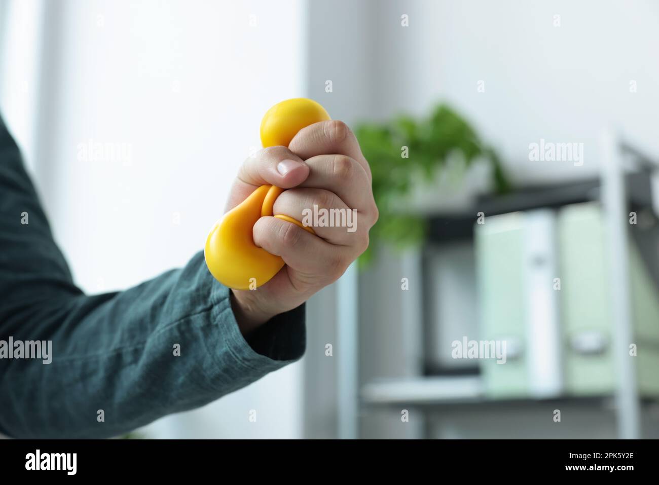 Stressball squeezing hi-res stock photography and images - Alamy