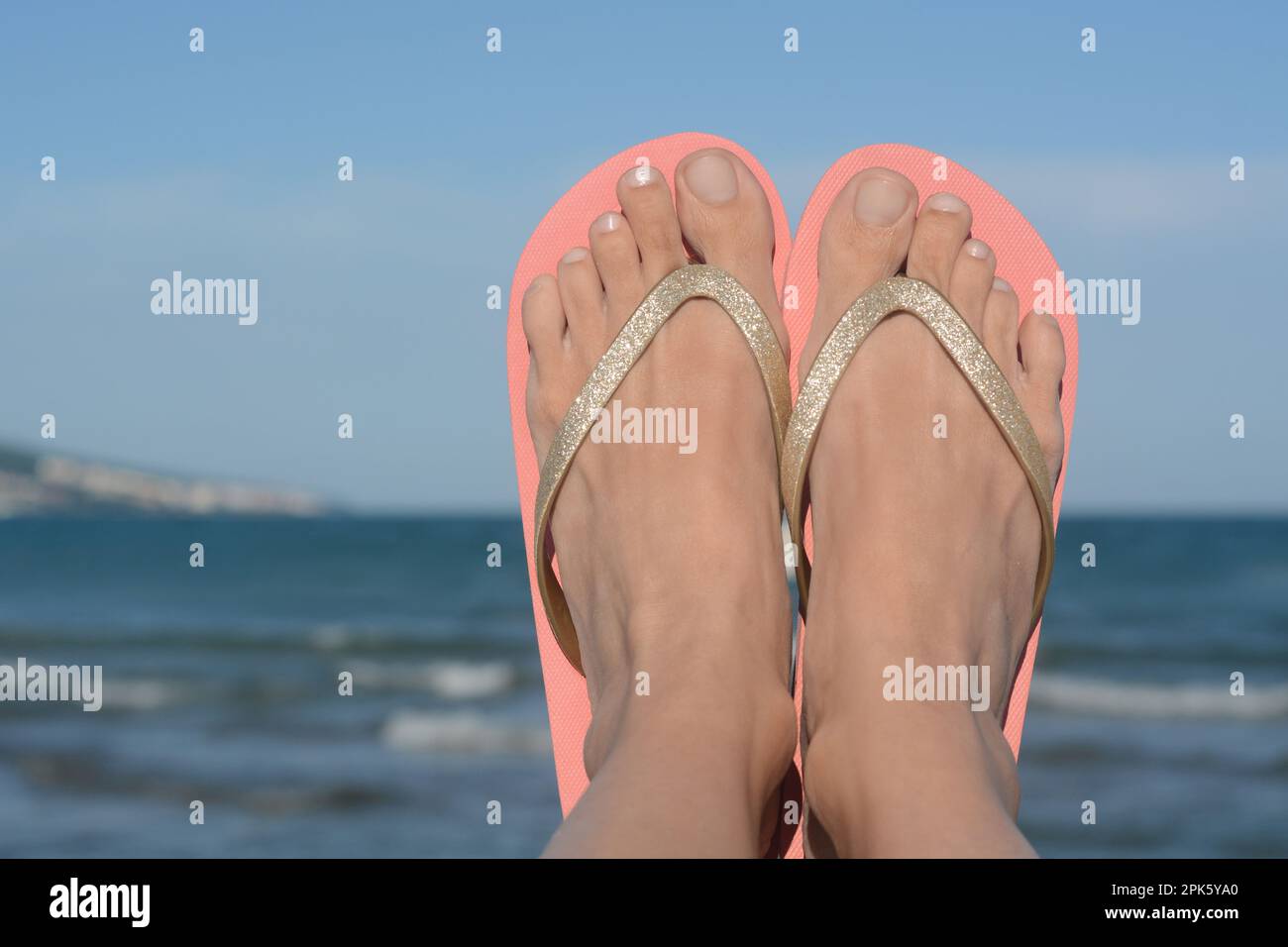 Woman wearing flip flops hi-res stock photography and images - Alamy
