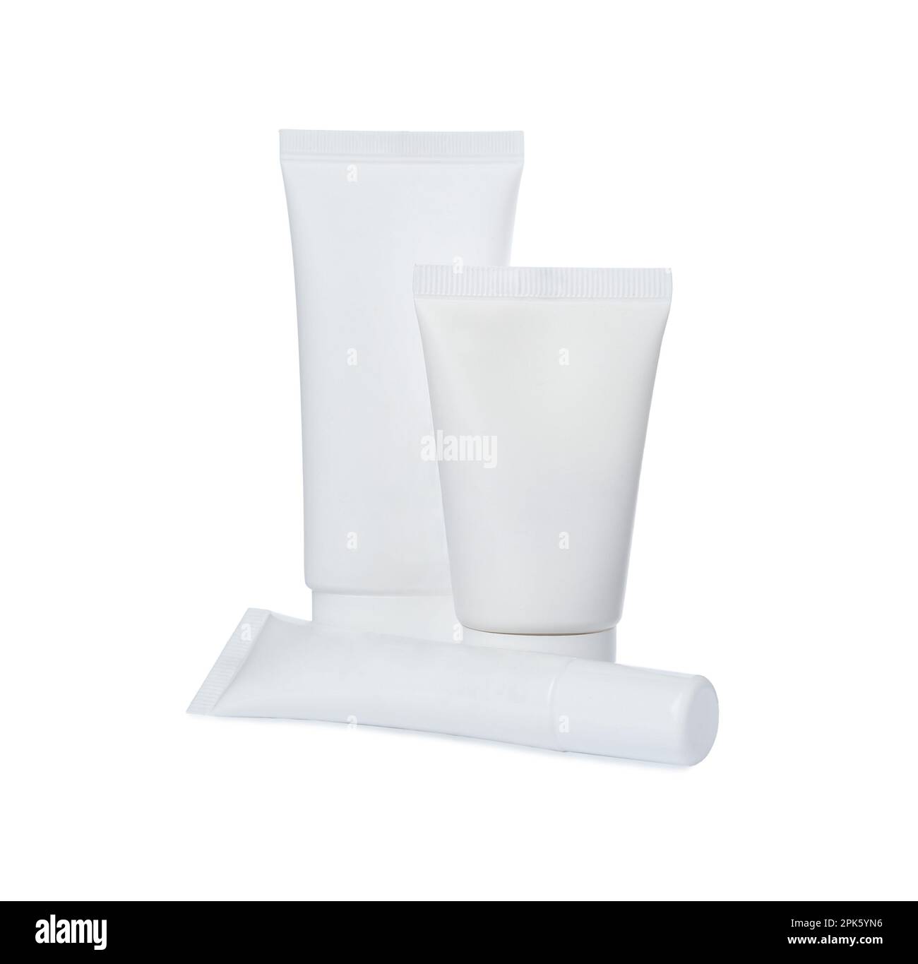 Tubes of different hand creams on white background. Mockup for design ...