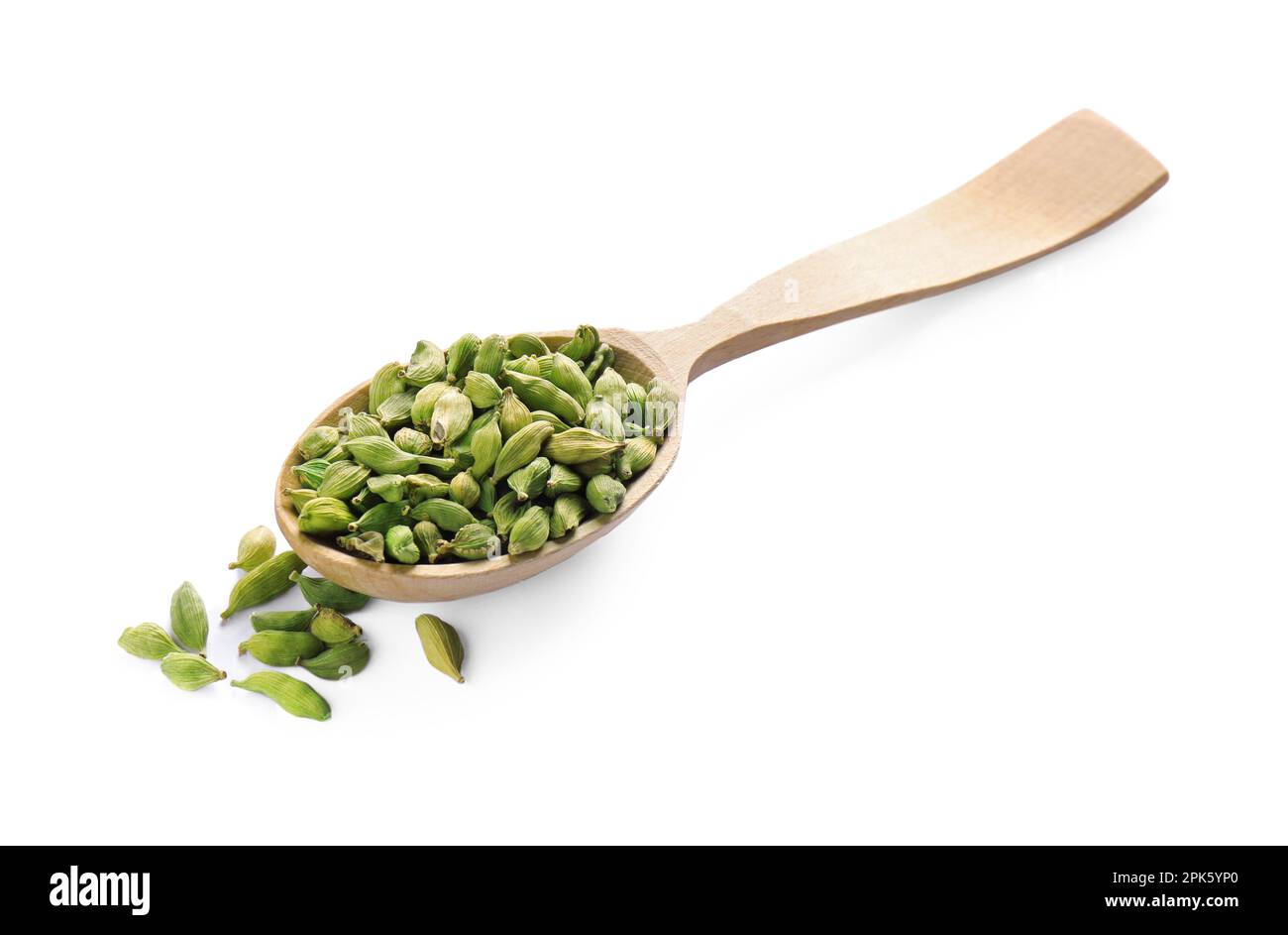 Wooden spoon with cardamom on white background Stock Photo - Alamy