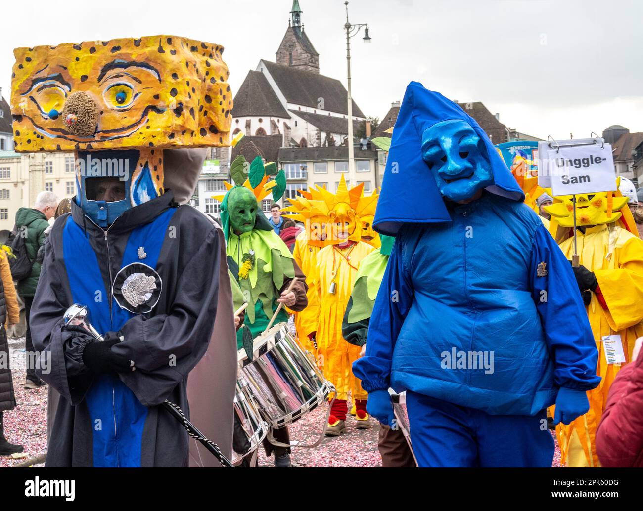 cheese, sun and sky Costume at the Basel Fasnacht parade in Switzerland ...