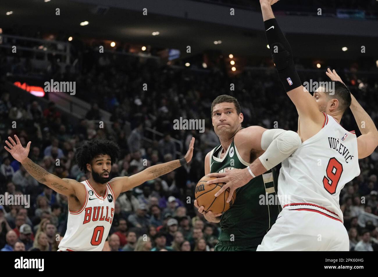 Milwaukee Bucks' Brook Lopez tries to get past Chicago Bulls' Nikola ...