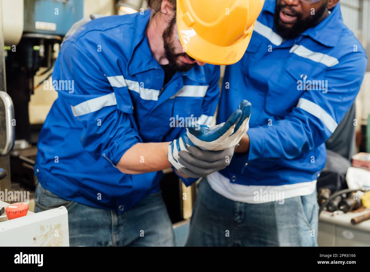 Engineer worker with accident at factory, Injury from machine working ...