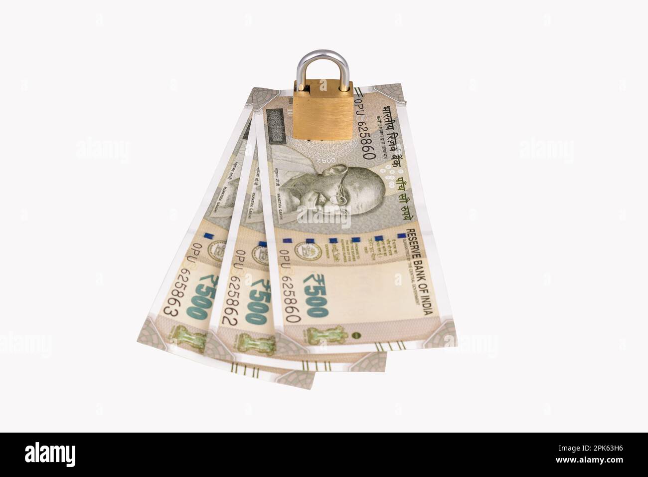 Closeup of padlock with indian currency note isolated on white ...
