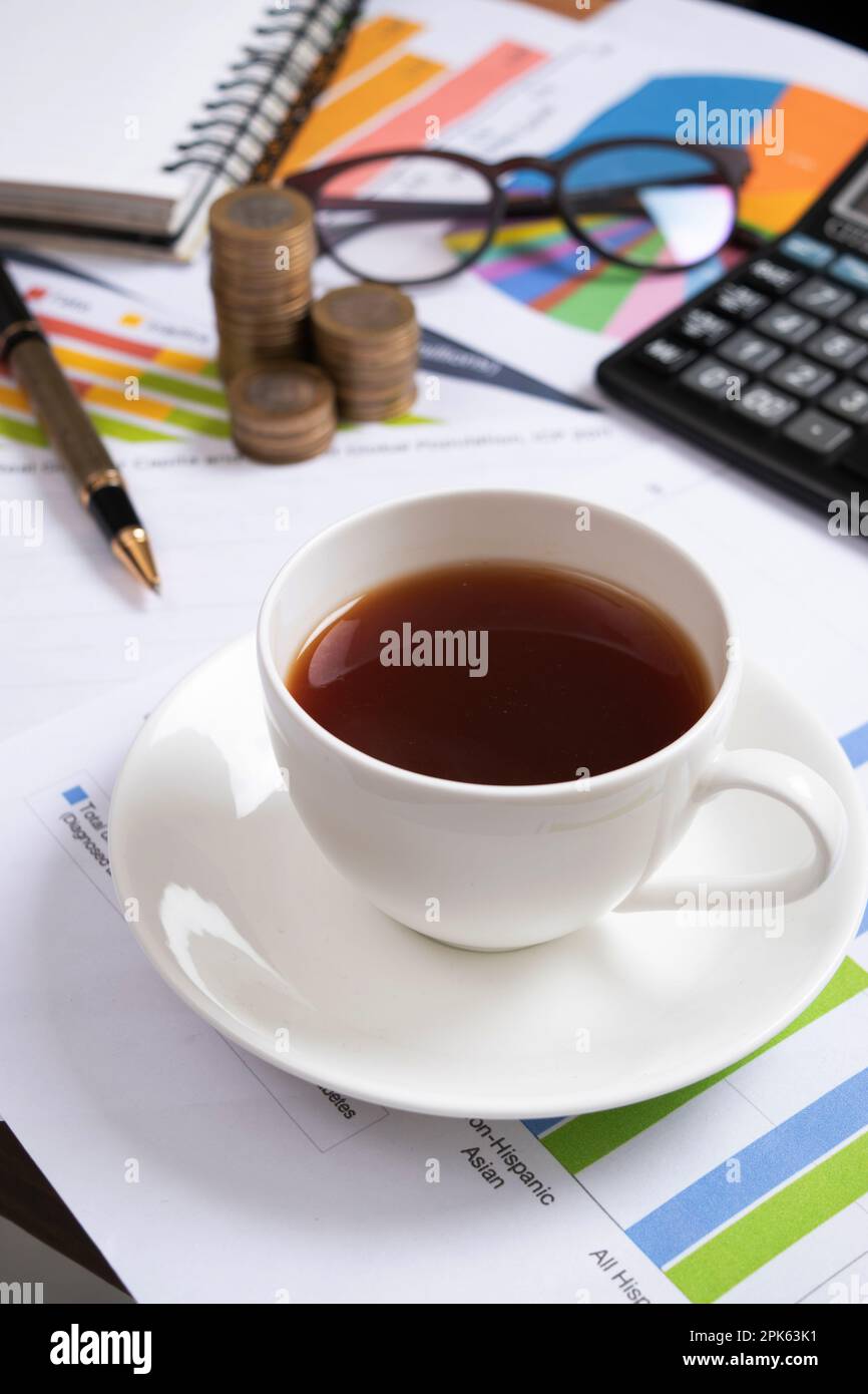 Cup of black tea at office table Stock Photo - Alamy
