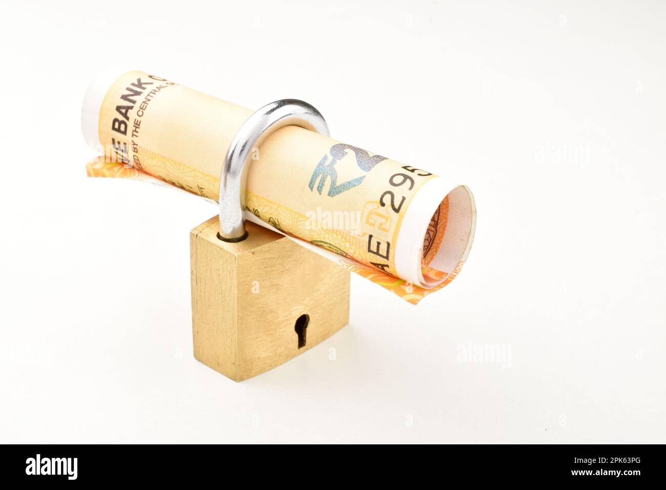 Indian currency note with lock on white background Stock Photo - Alamy