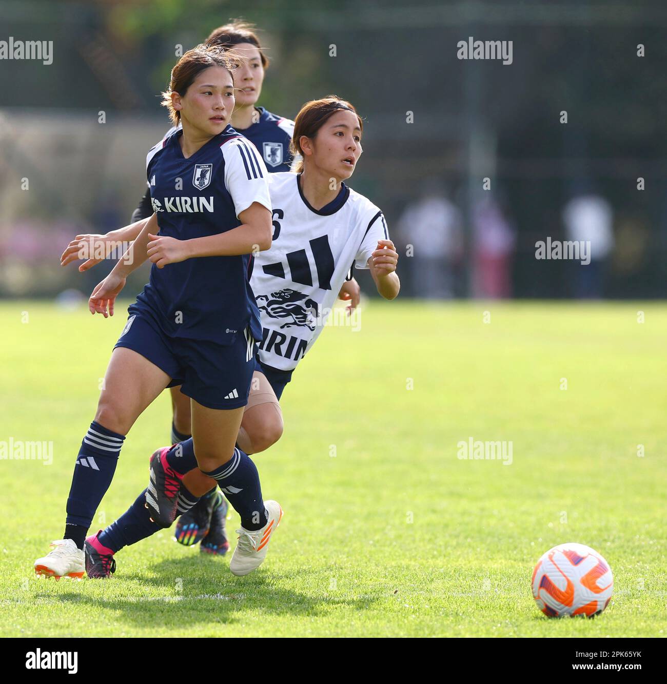 Mana Iwabuchi (R) of Japan women's national football team (nicknamed "Nadeshiko Japan") takes ...