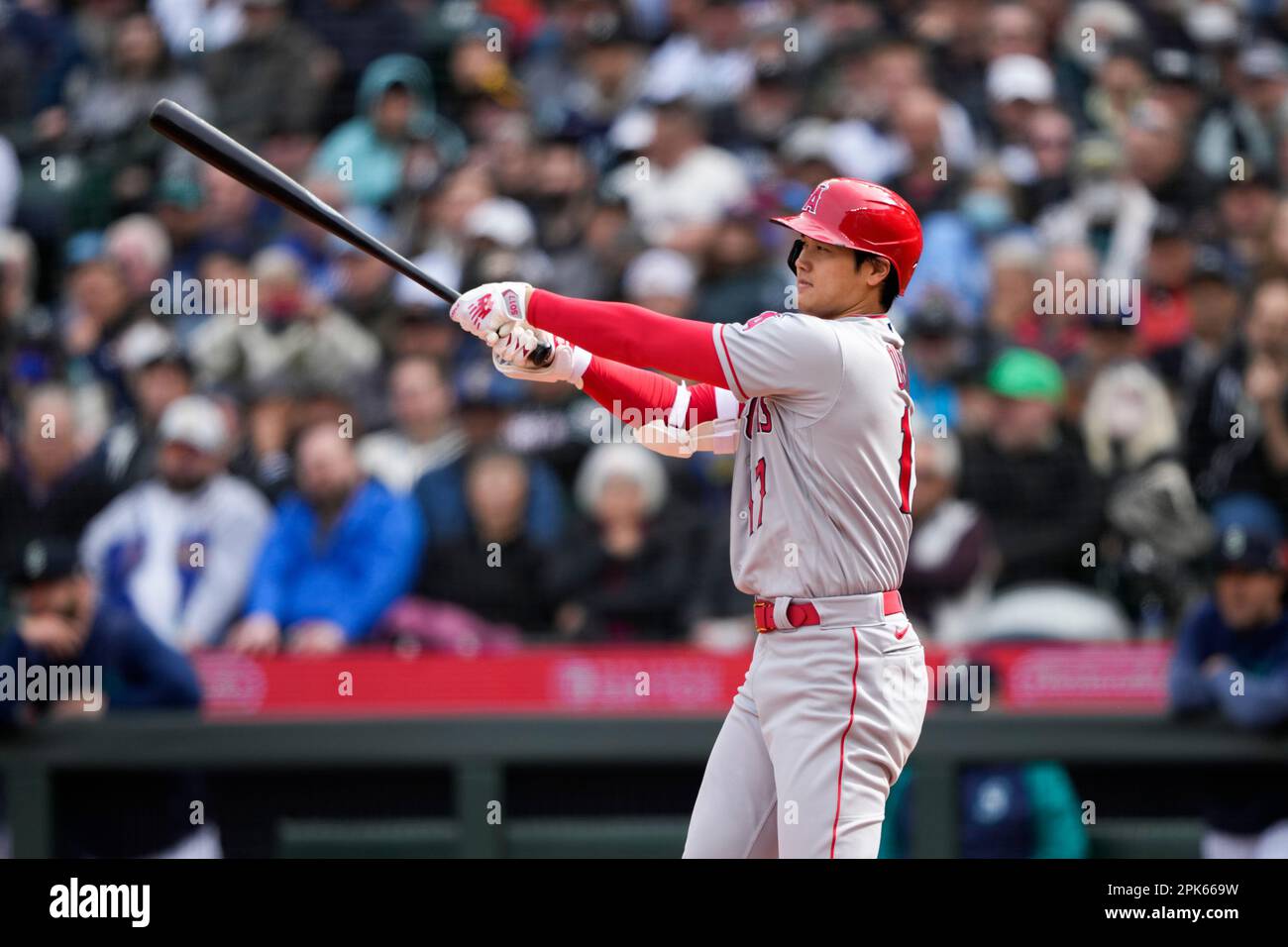 Los Angeles Angels' Shohei Ohtani follows through on a swing while ...