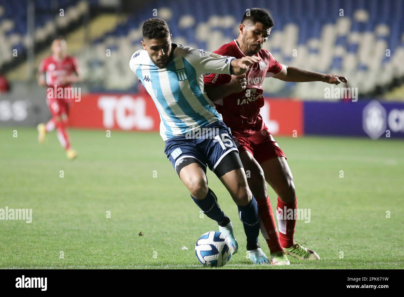 Nicolas Zalazar of Chile's Nublense, right, and Maximiliano Romero of ...