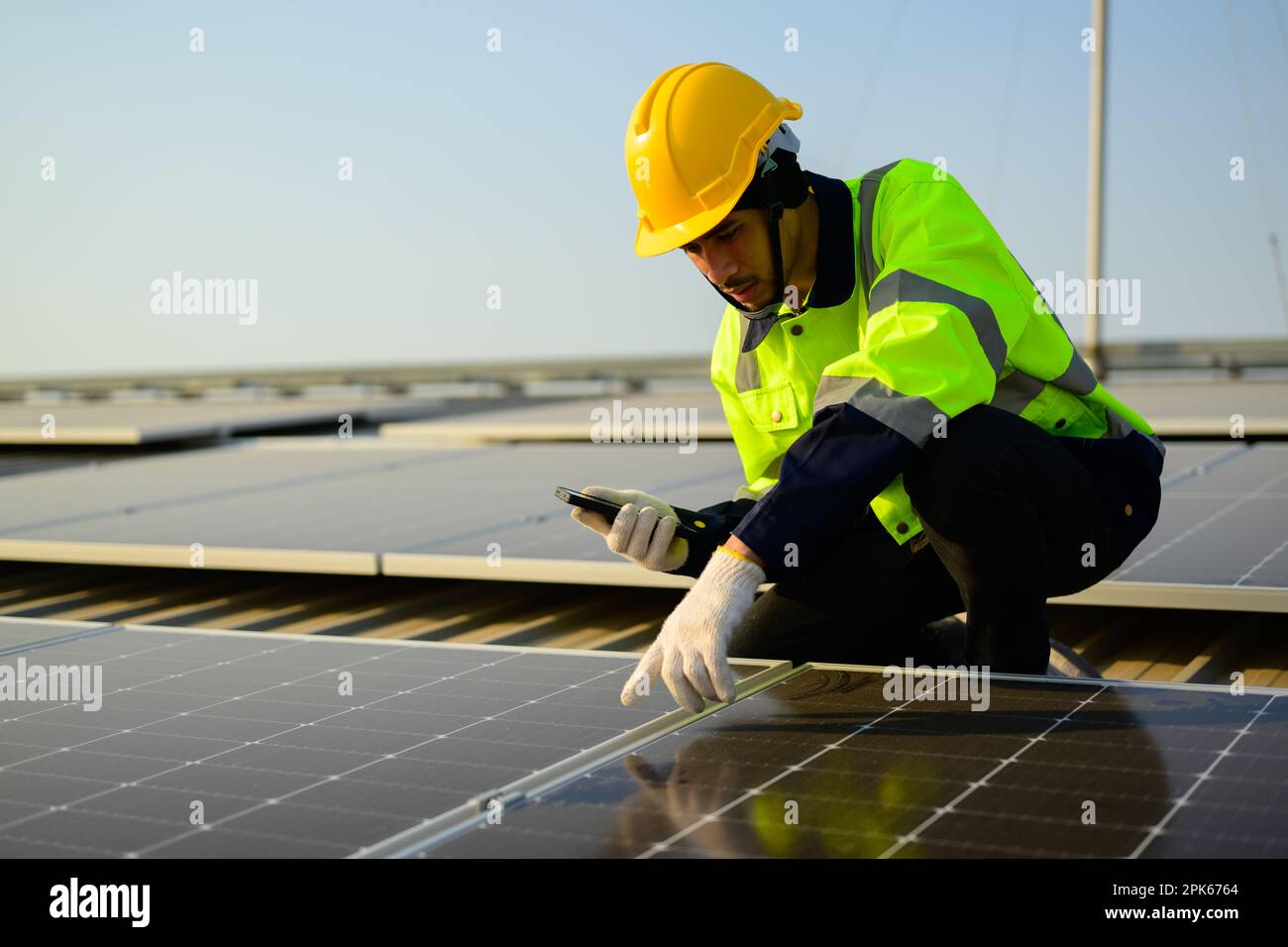 Professional engineer technician with safety helmet checking system ...