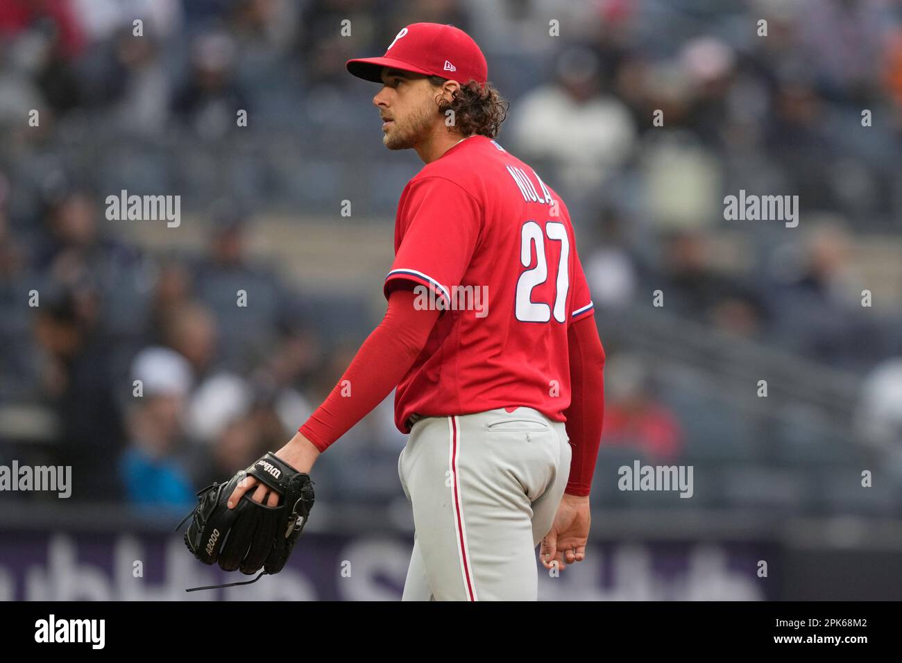 Philadelphia Phillies starting pitcher Aaron Nola (27) waits to be ...