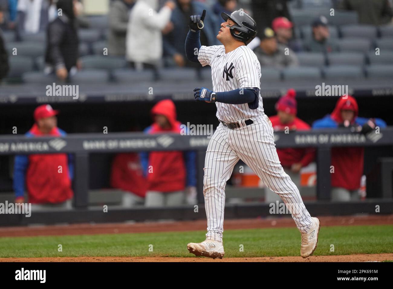 New York Yankees' Jose Trevino celebrates as he runs the bases on a two ...
