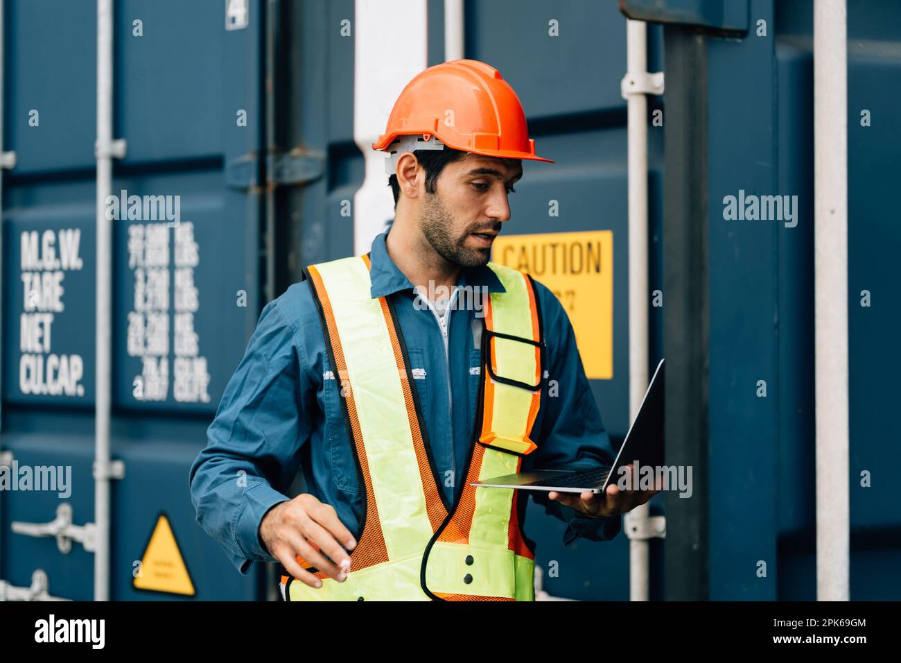 Warehouse engineer worker working at industrial container yard Stock ...