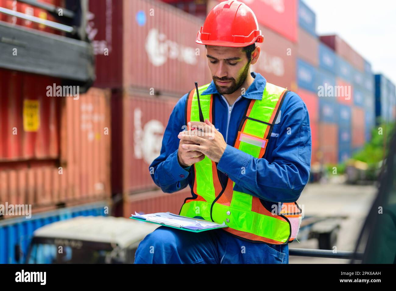 Warehouse engineer worker working at industrial container yard Stock ...