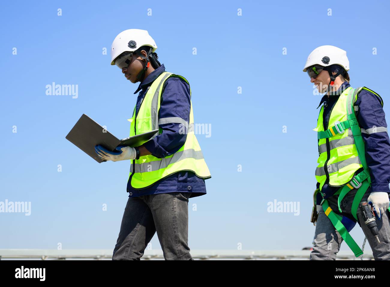 Professional engineer technician with safety helmet checking system ...