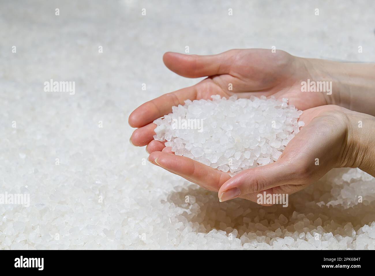 sea salt heap in hands. Rock salt, salt flakes, Nin, Croatia. Salt ...