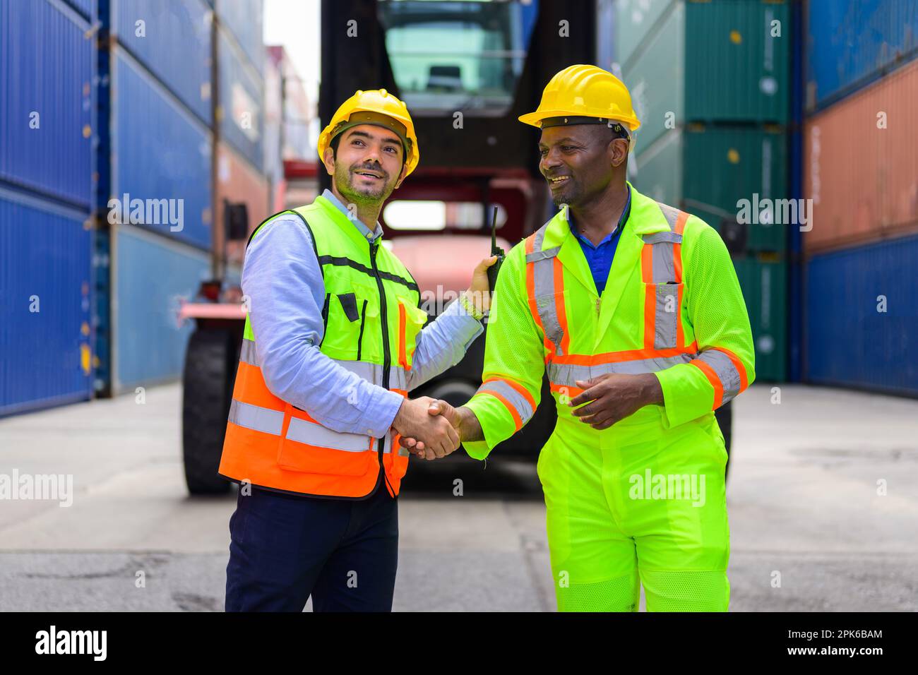 Warehouse engineer worker checking and working at industrial container ...