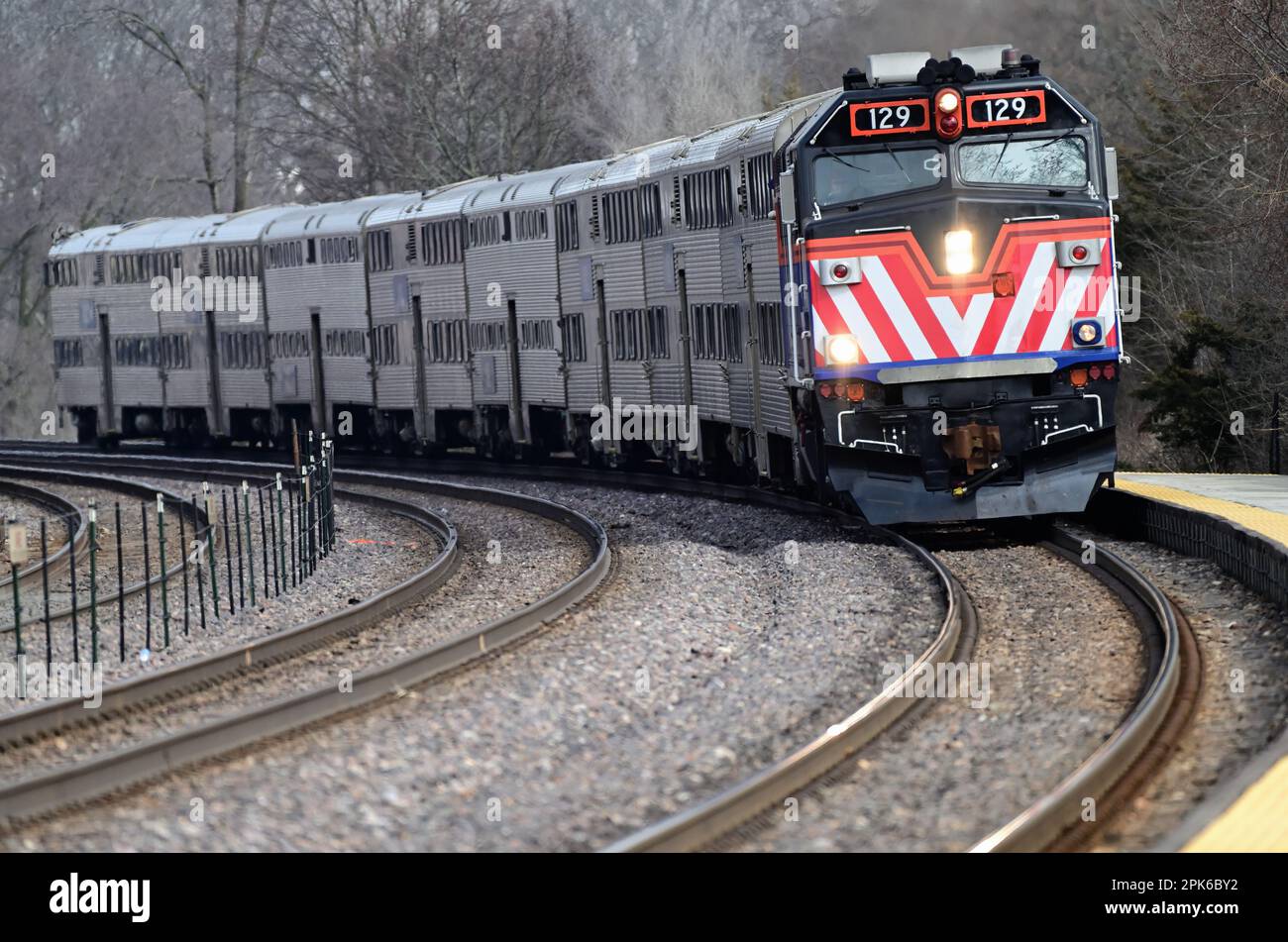 Winfield, Illinois, USA. A Metra commuter train on a curve as it ...